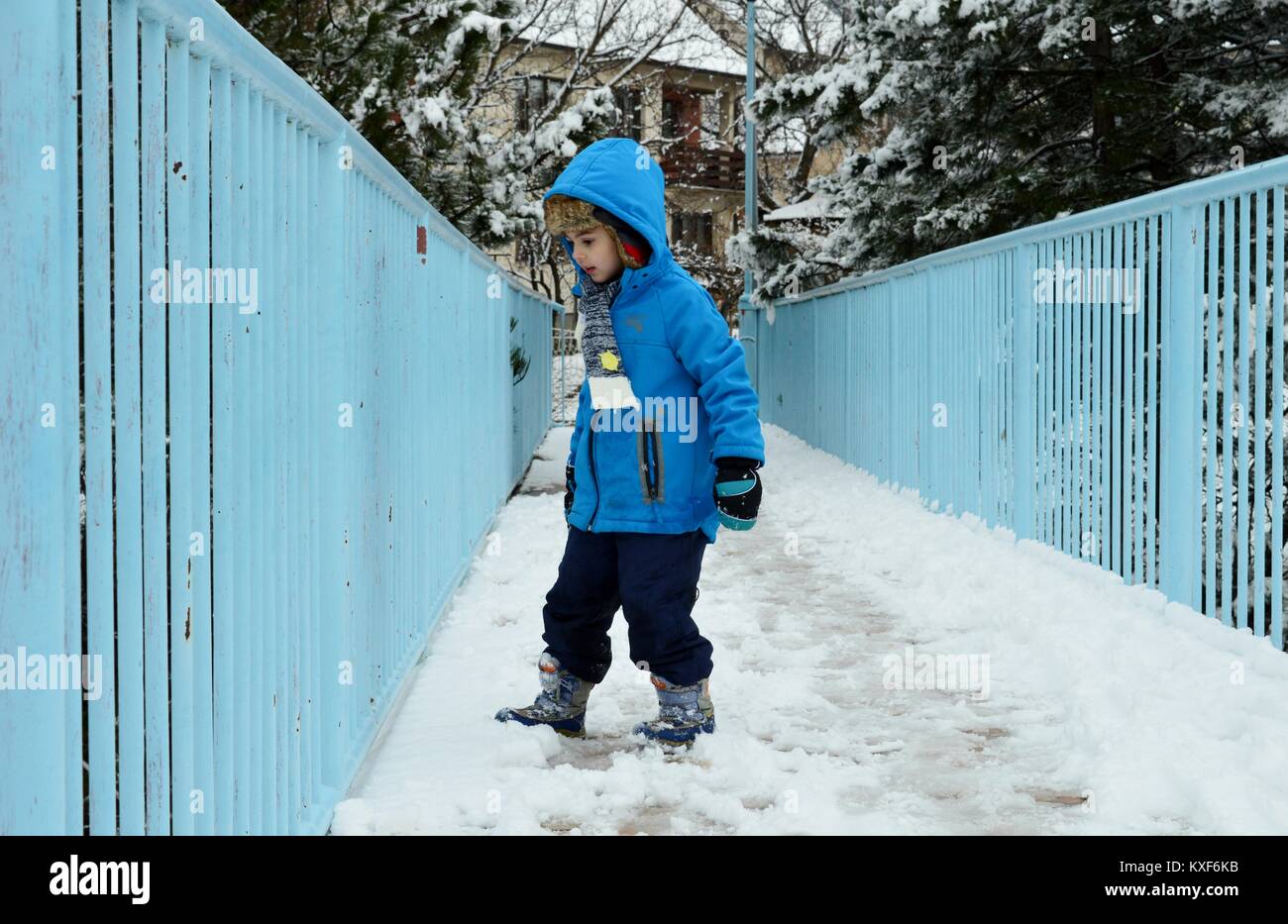 boy on the pedestrian bridge Stock Photo - Alamy