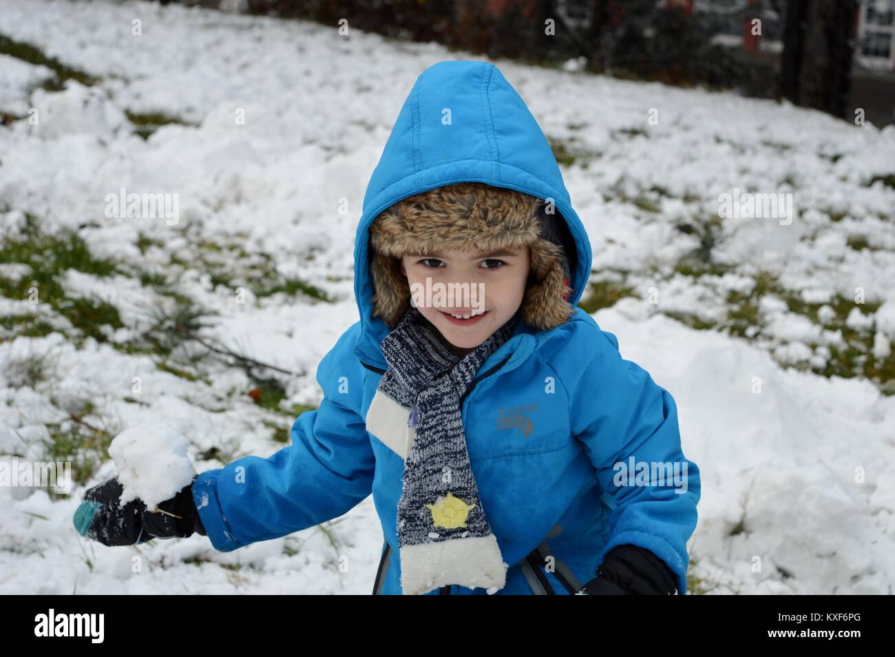 a boy in the snow Stock Photo - Alamy