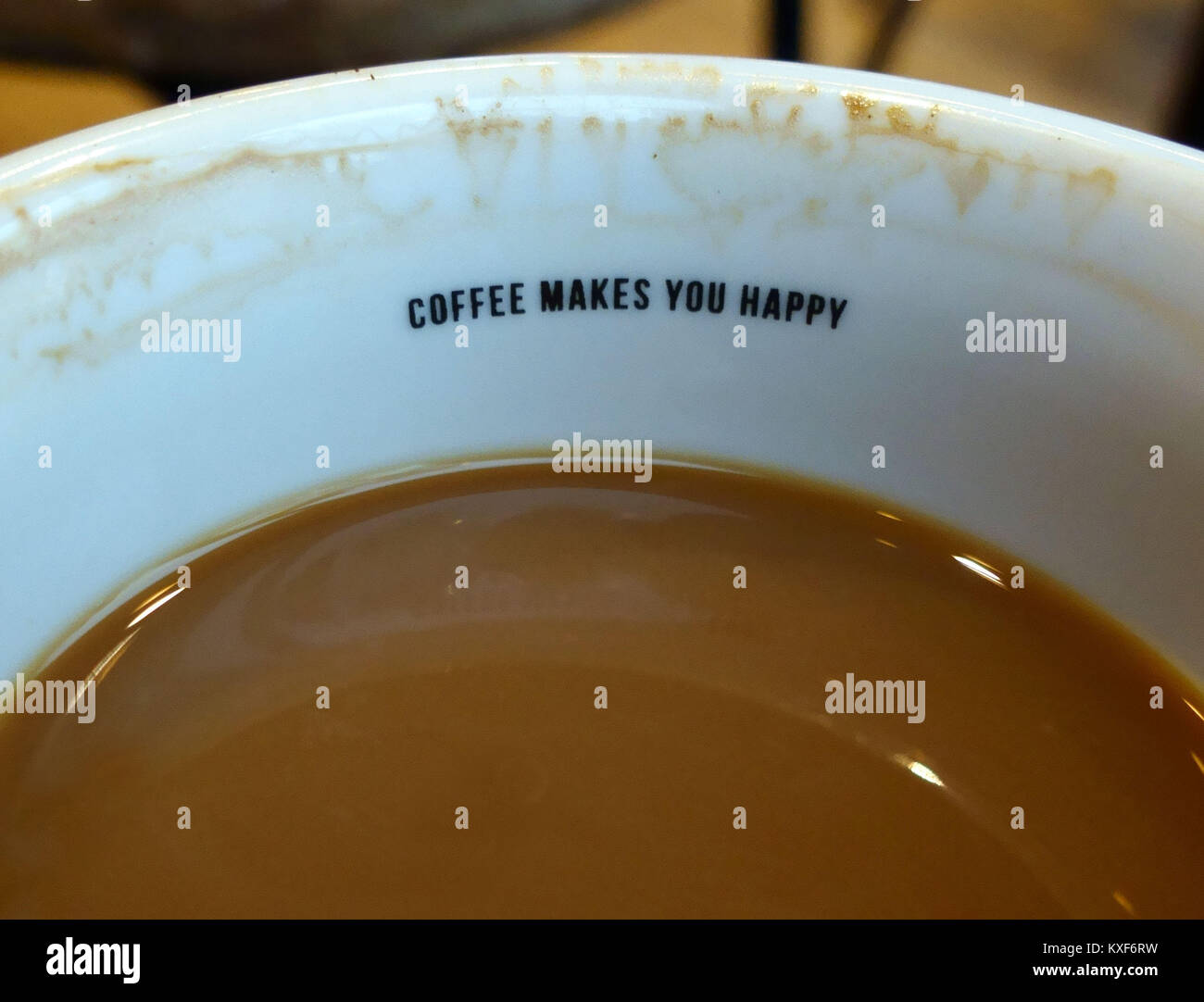 "Coffee Makes You Happy" slogan inside coffee shop cup, London Stock ...
