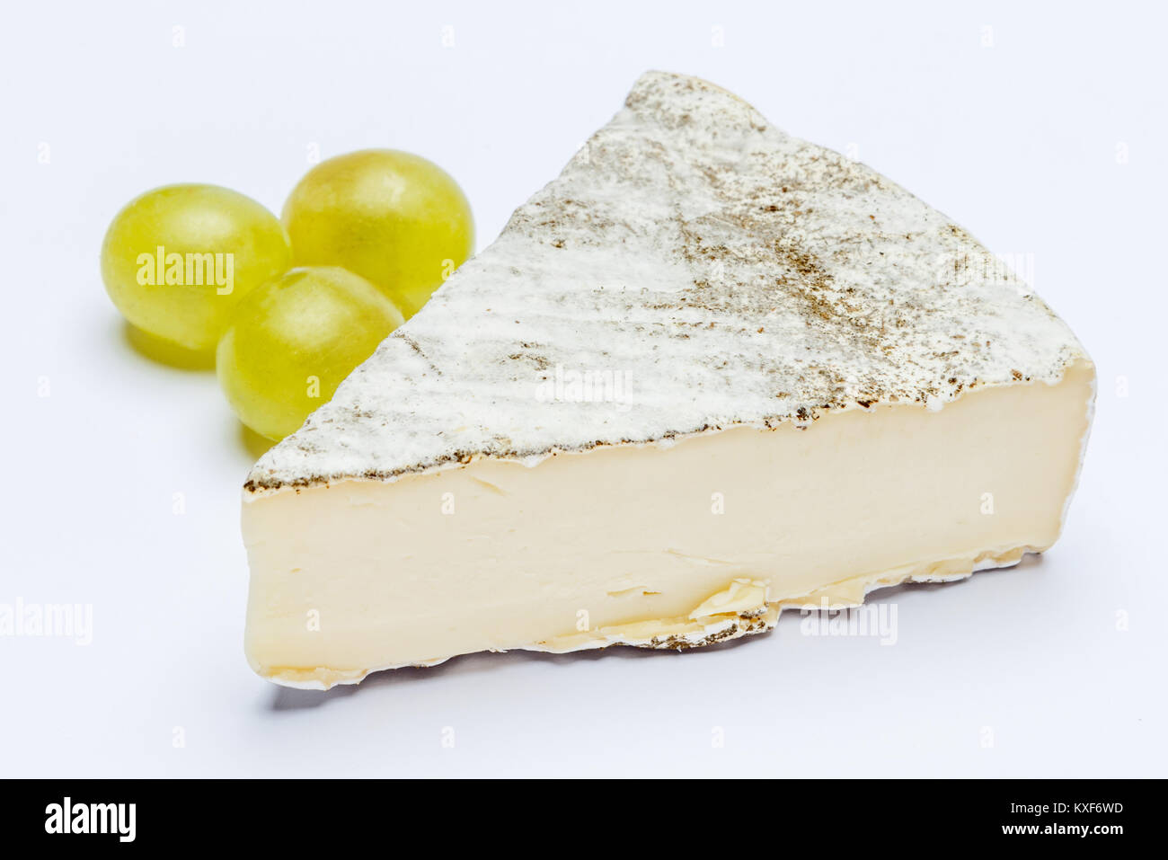 traditional french brie cheese on a white background Stock Photo - Alamy