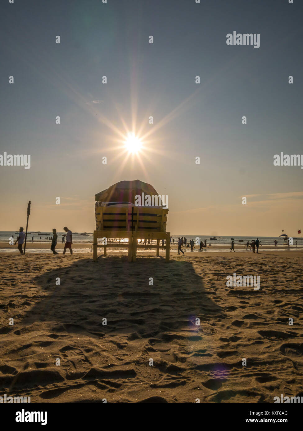 Goa, India - December, 21 2017 : Beach bed with umbrella with sun ...