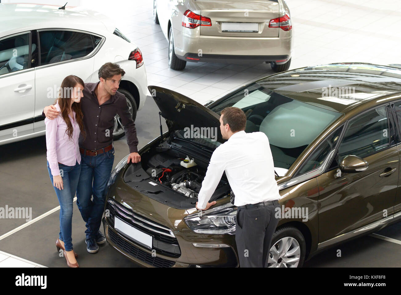 Car dealership advice - sellers and customers when buying a car Stock ...