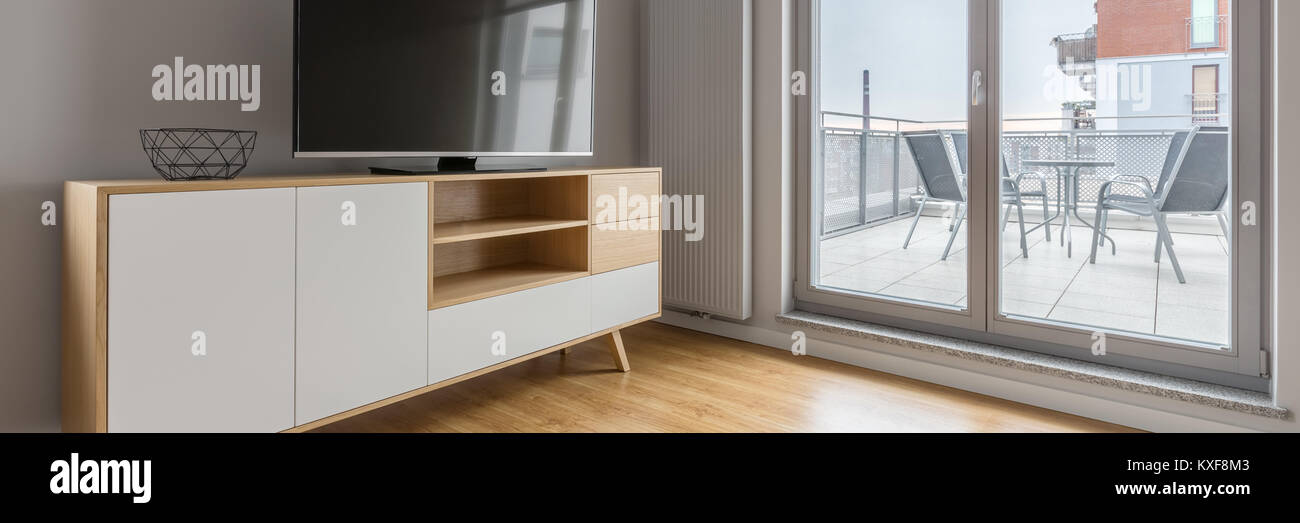 Panoramic view of living room and window entrance to balcony Stock ...