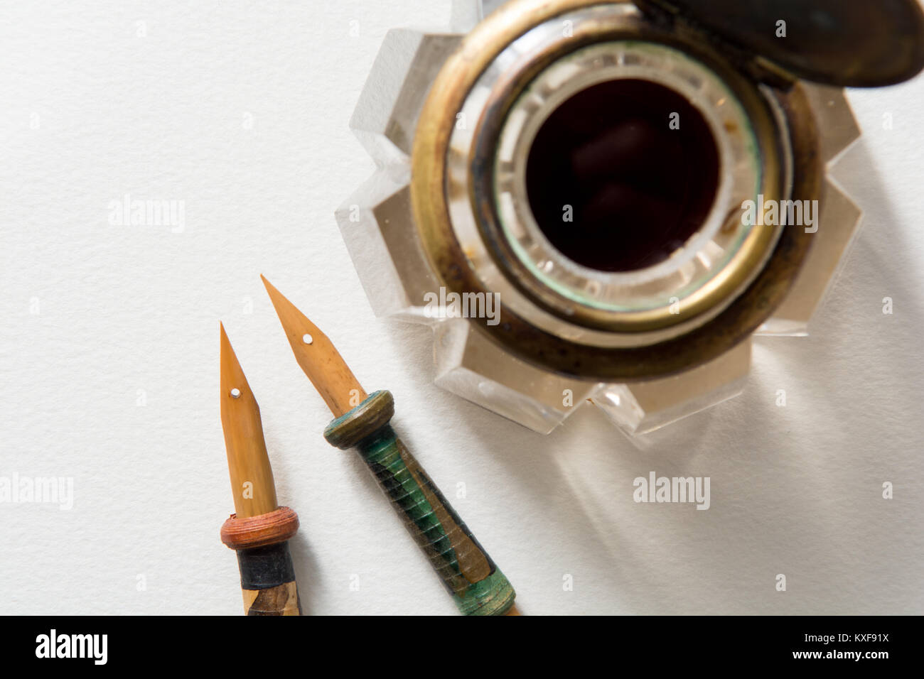 Calligraphy pens on white paper with blank space for a message Stock ...