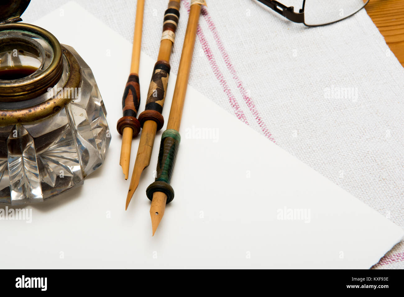 Calligraphy pens on white paper with blank space for a message Stock ...