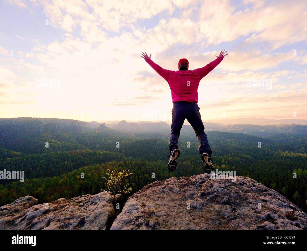 Man dangerously jumping on the edge. Man jump. Young man falling down ...