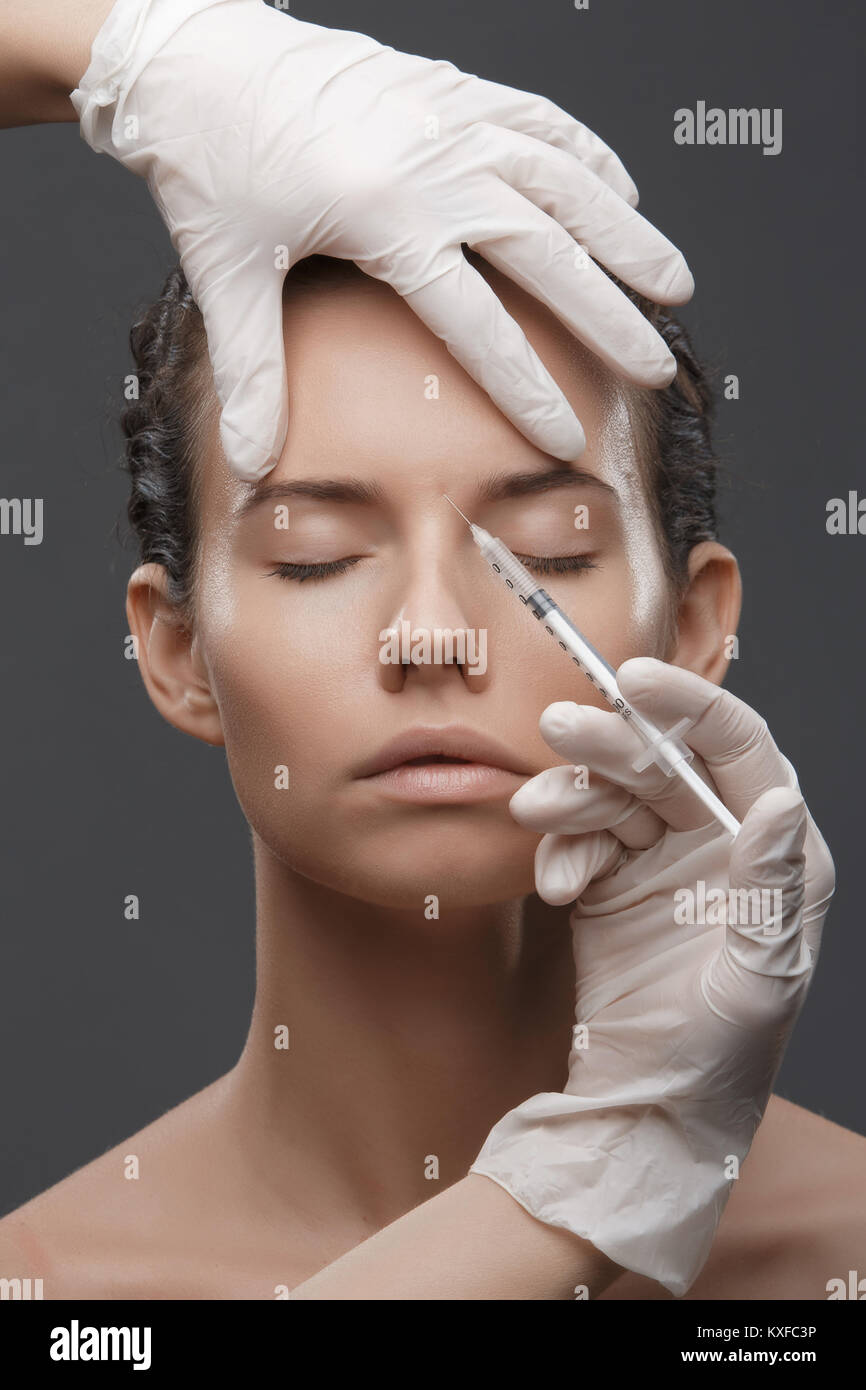 Woman Getting An Injection Stock Photos & Woman Getting An Injection ...