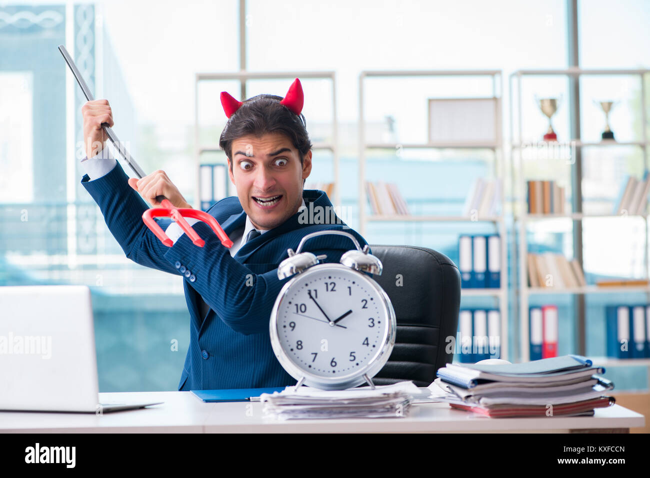 Devil angry businessman in the office Stock Photo - Alamy