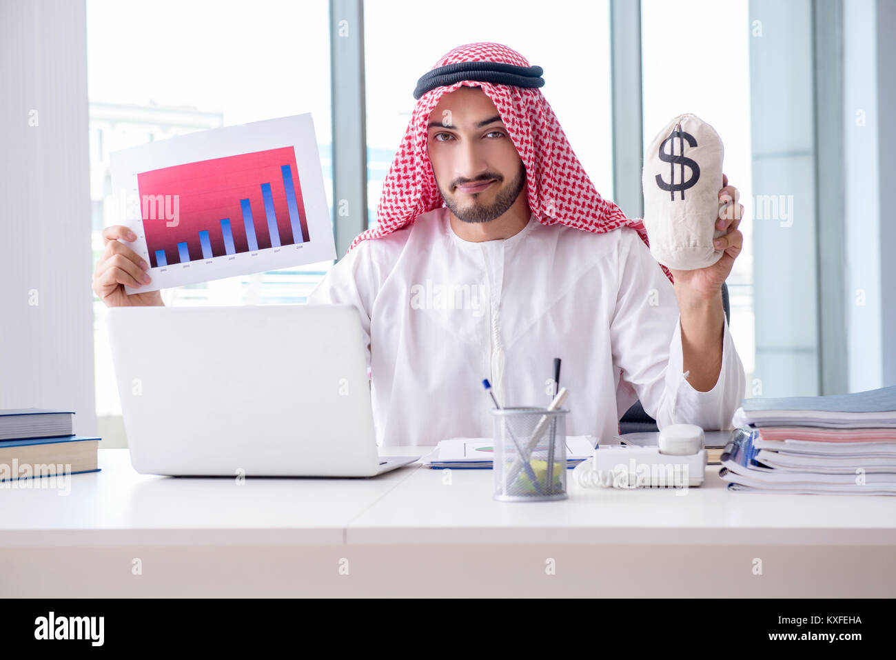 Arab businessman working in the office Stock Photo - Alamy