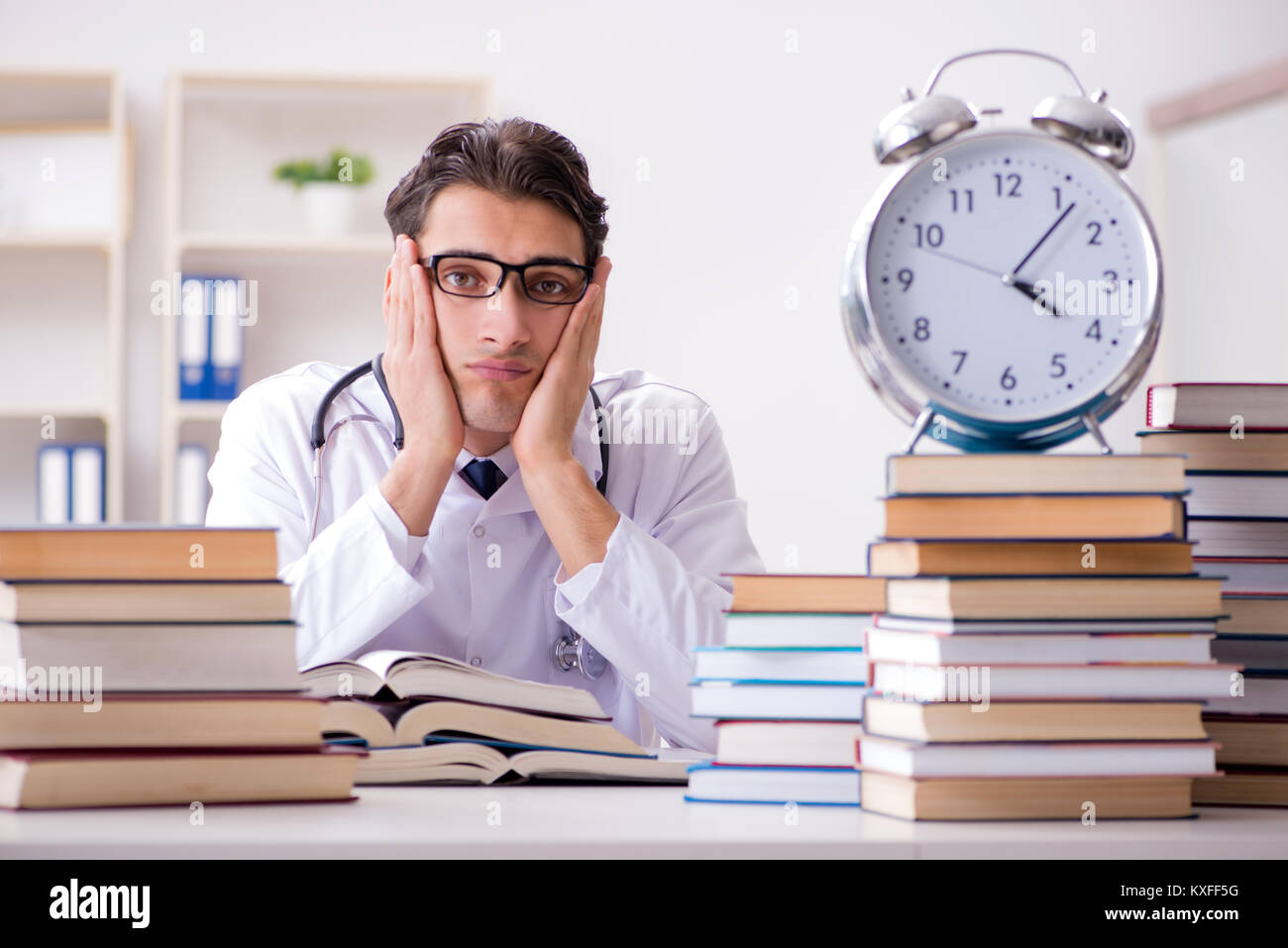 Medical student running out of time for exams Stock Photo - Alamy