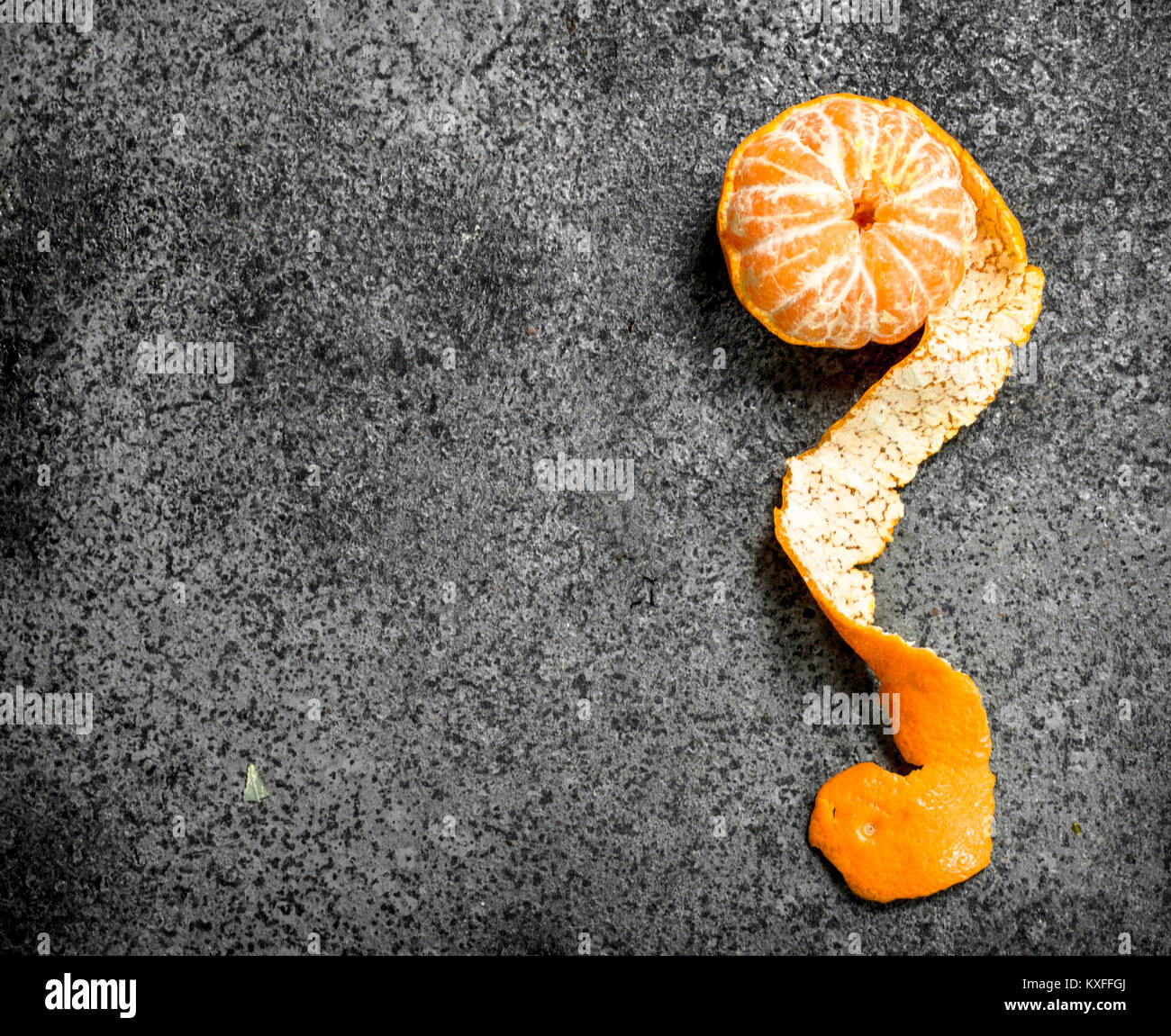 Purified ripe mandarin. On a rustic background Stock Photo - Alamy