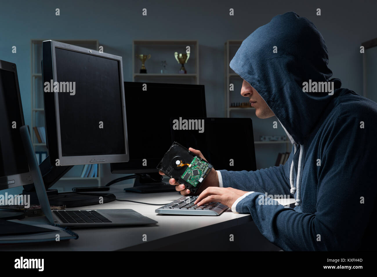 Hacker hacking computer at night Stock Photo - Alamy