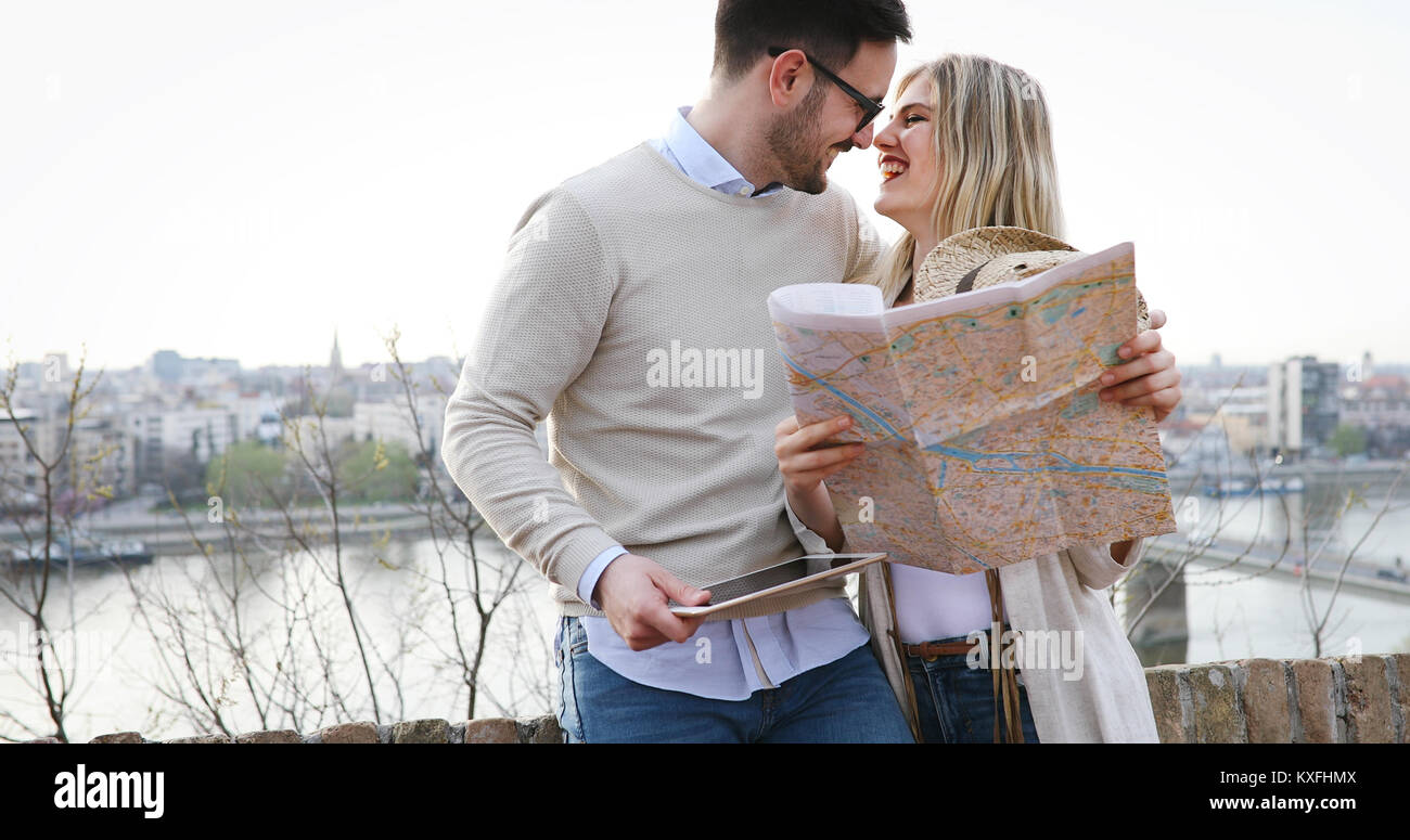 Tourist couple exploring city Stock Photo - Alamy