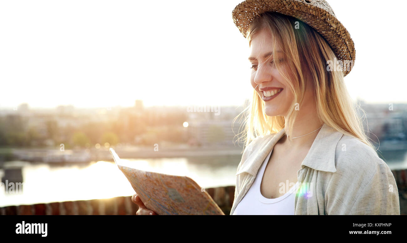 Happy female tourist sightseeing and exploring Stock Photo - Alamy