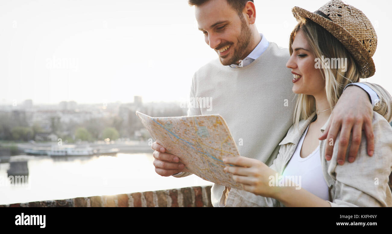 Tourist couple exploring city Stock Photo - Alamy