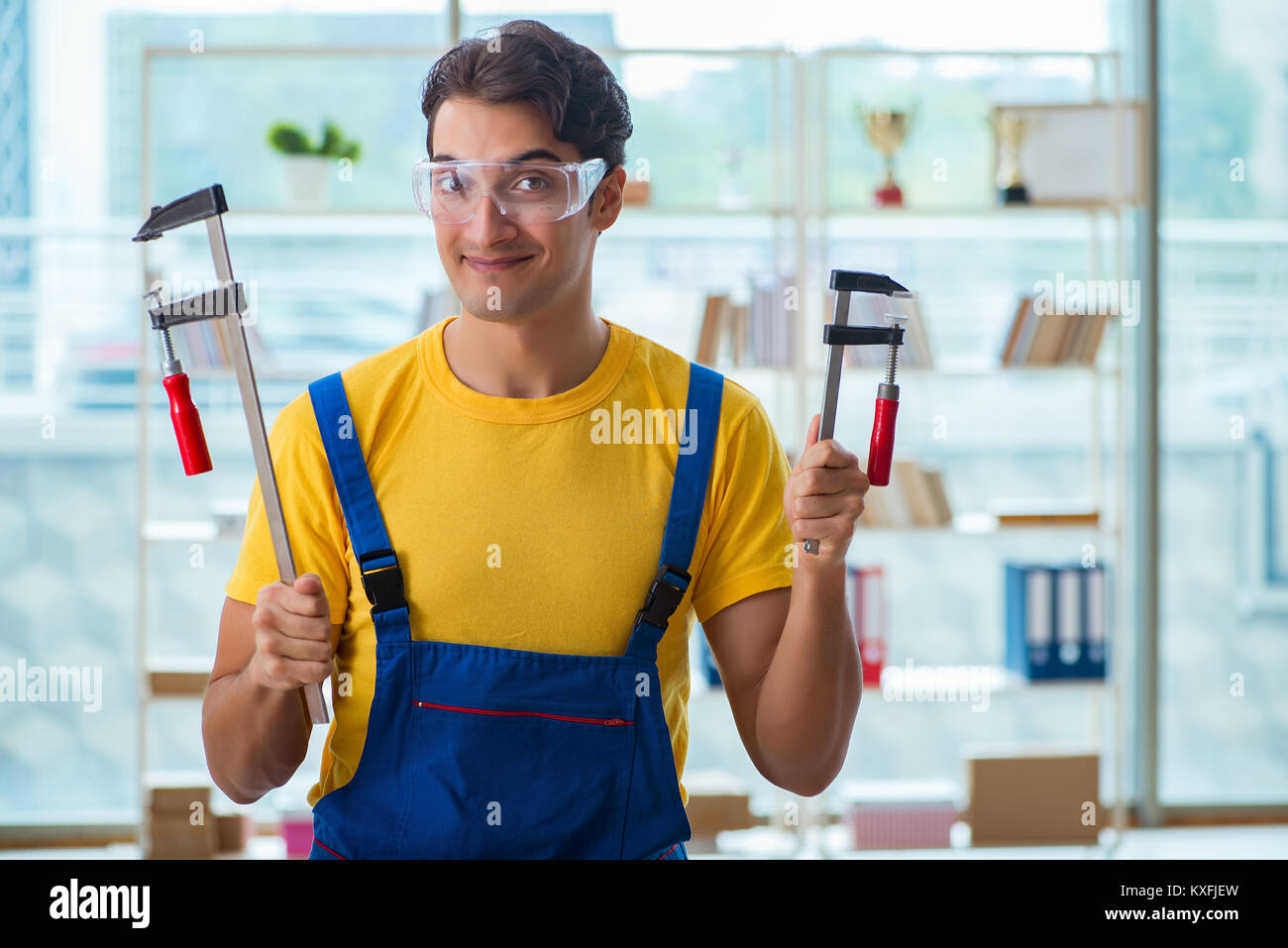 Furniture carpenter working in the workshop Stock Photo - Alamy