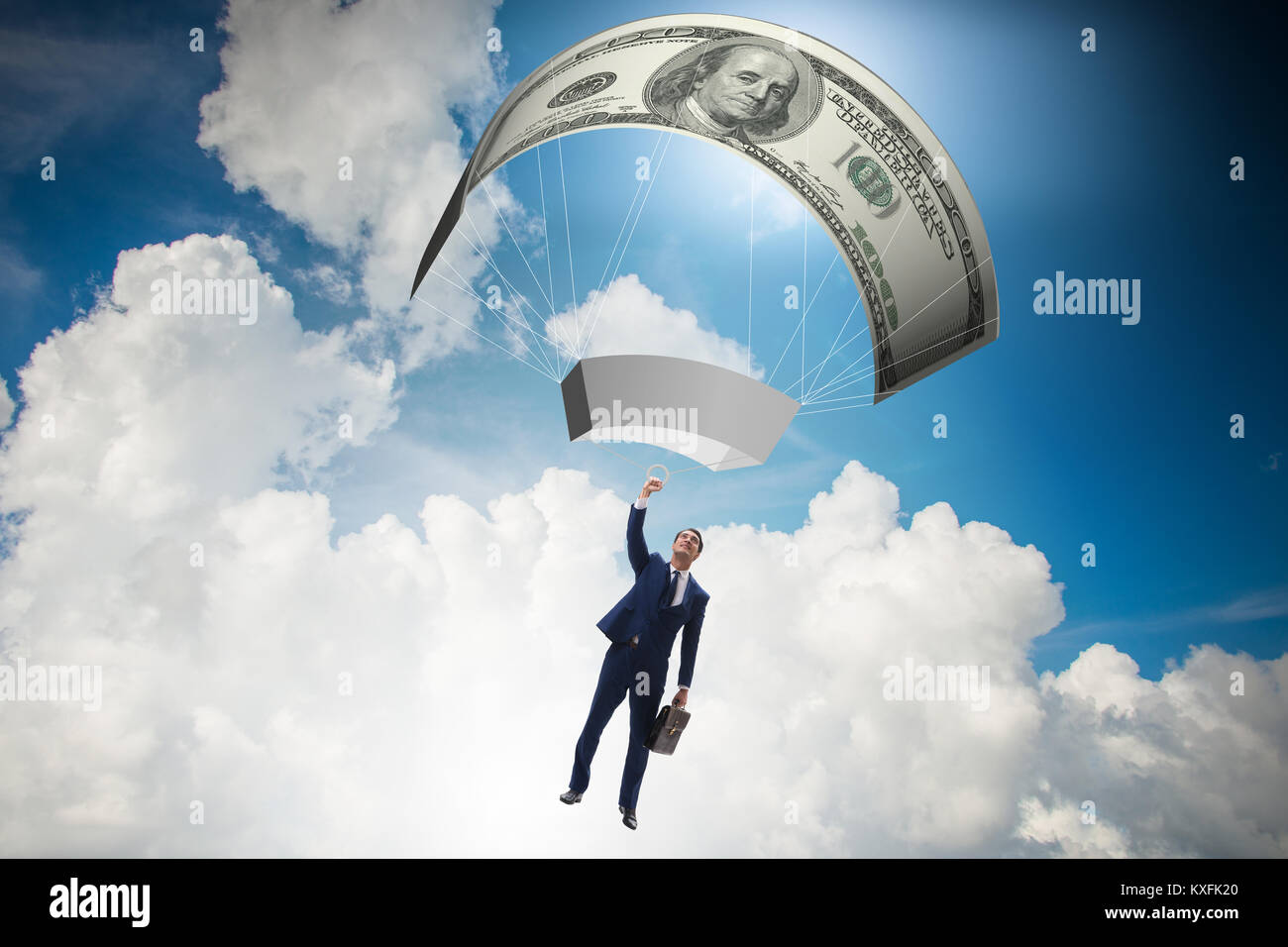 Businessman in golden parachute concept Stock Photo - Alamy