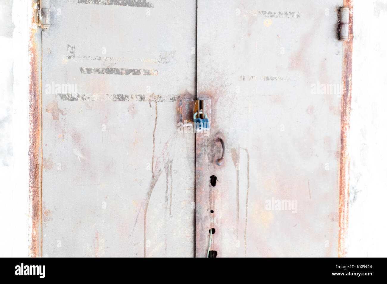 Closed padlock on steel doors. The locked doors Stock Photo - Alamy