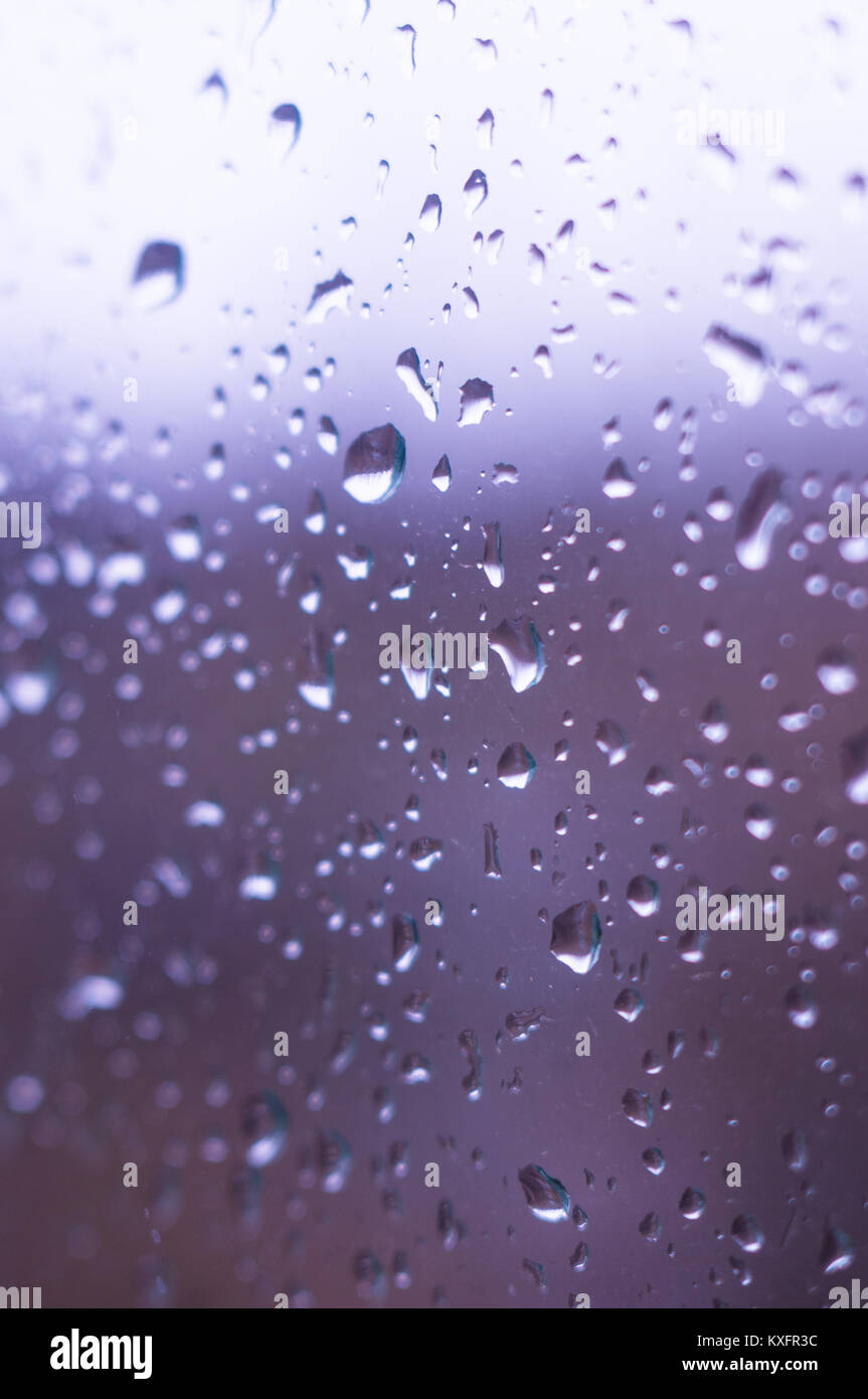 raindrops on the window glass, toned, close up Stock Photo - Alamy