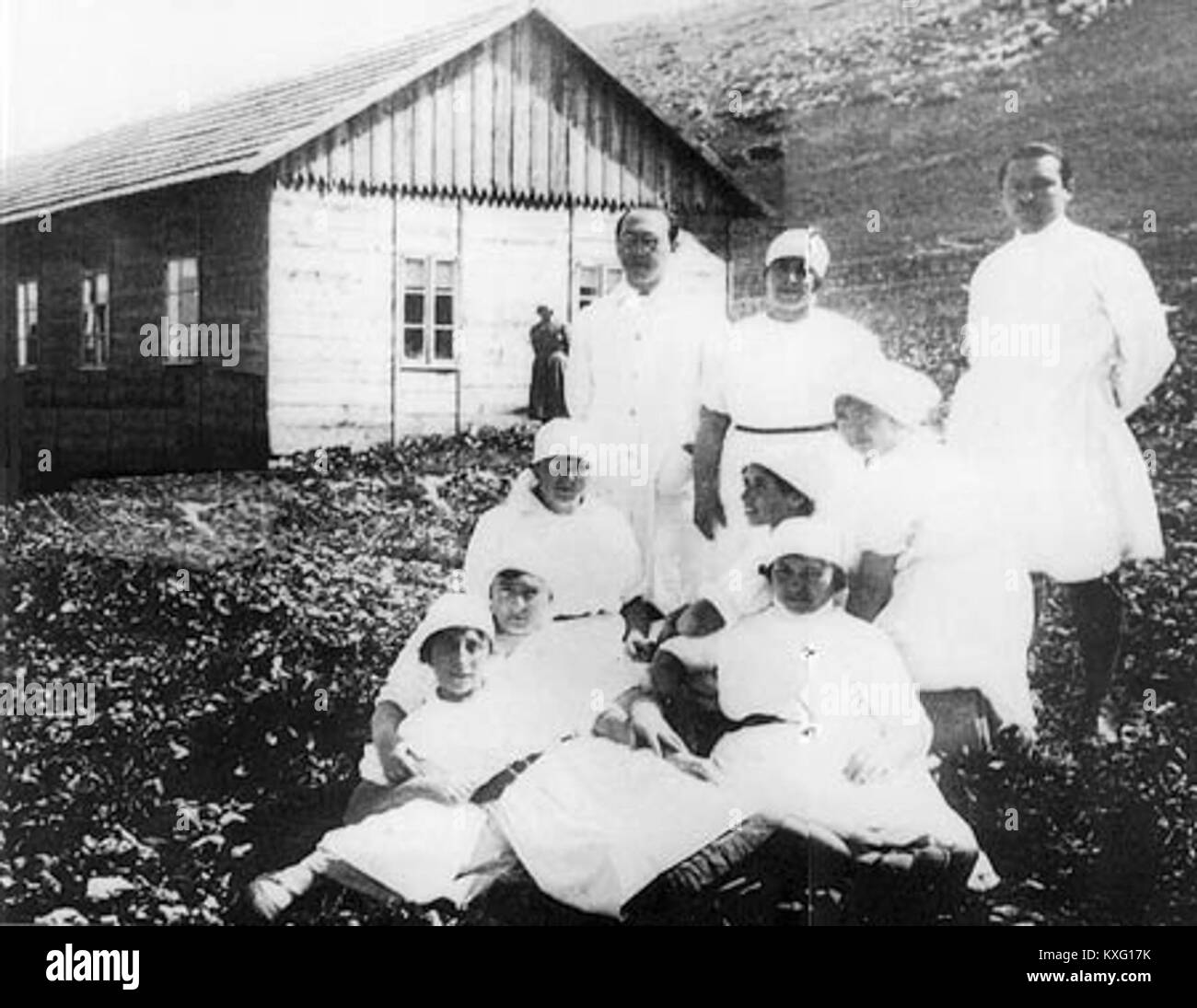 A group photograph showing the staff of the first hut at the Valley ...