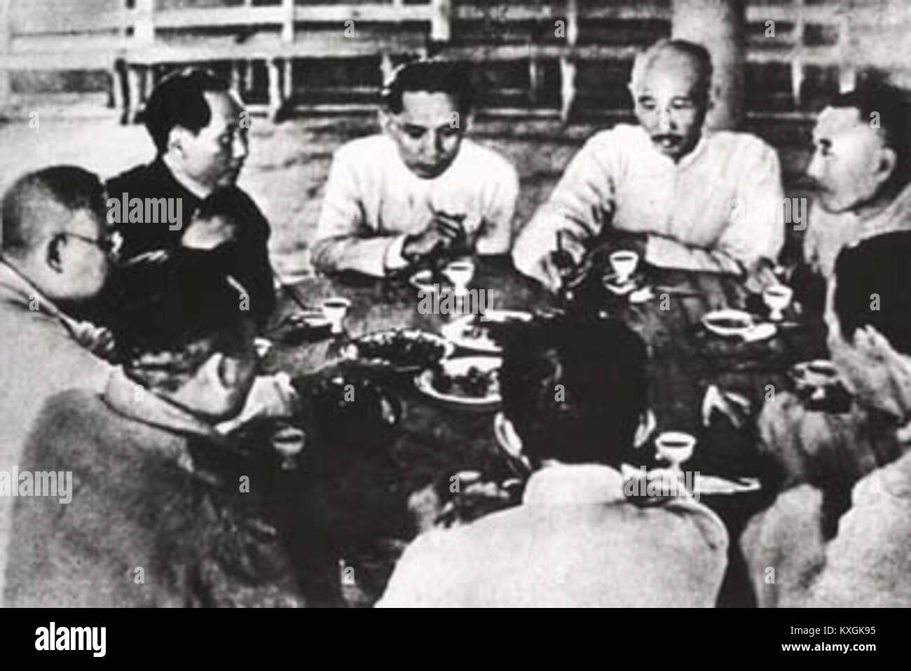 A historical photograph of Mao Zedong, Zhu De, and six political ...