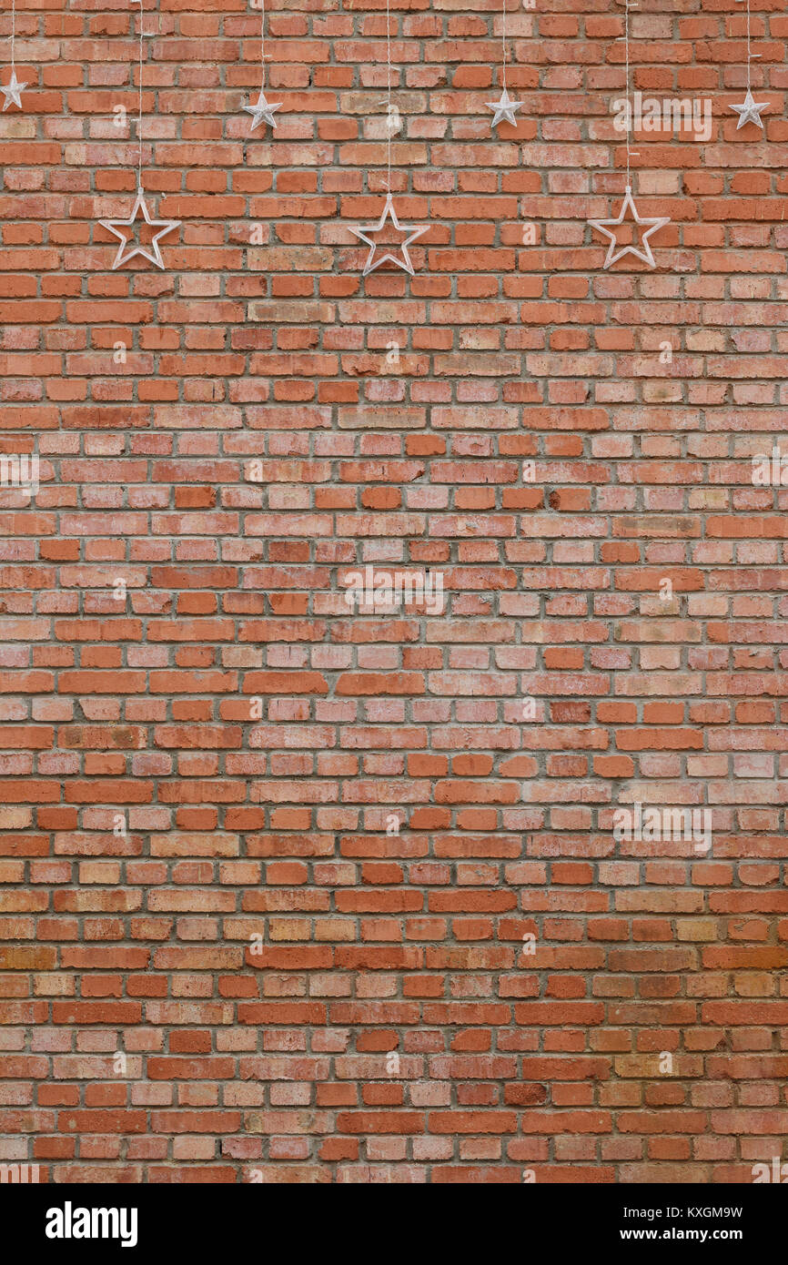 A red brick wall and star's lamp ornament Stock Photo - Alamy