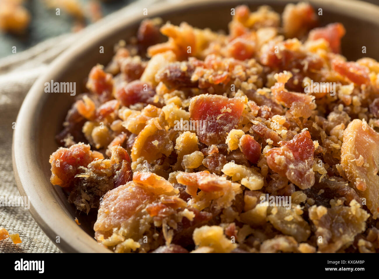 Organic Crumbled Bacon Pieces in a Bowl Stock Photo - Alamy