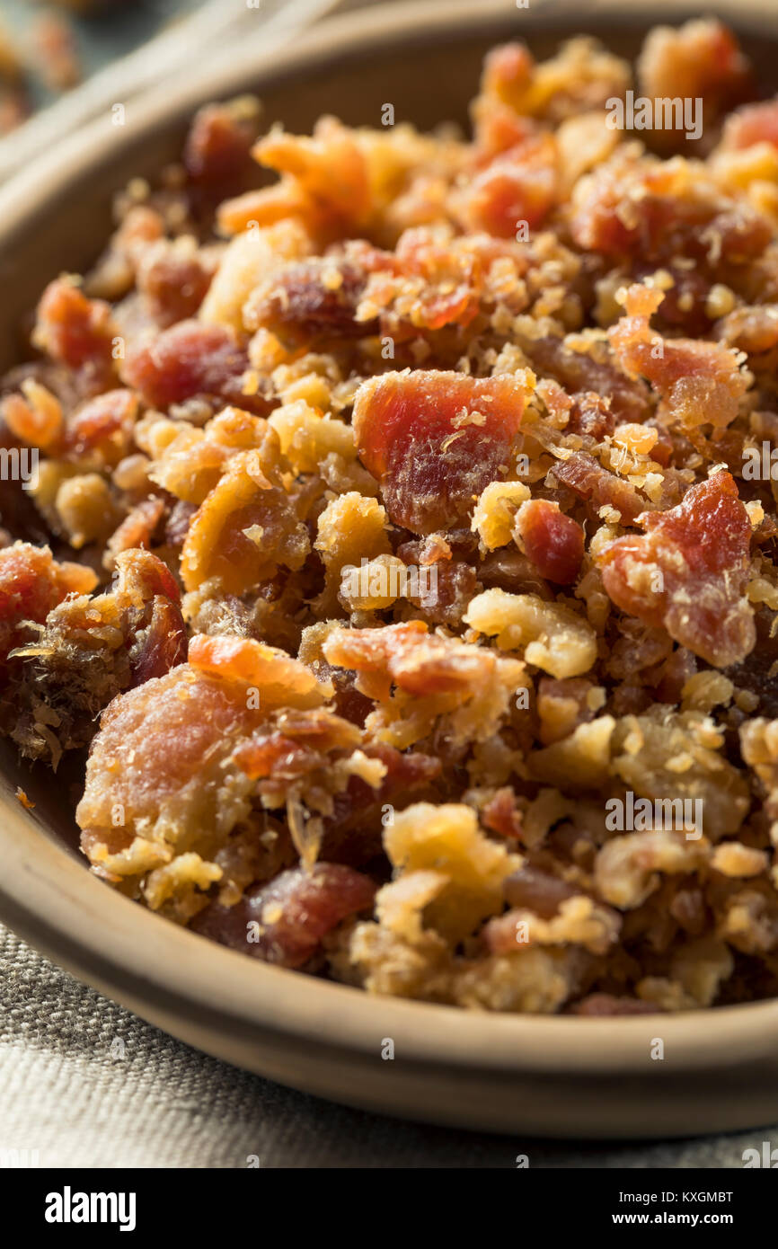 Organic Crumbled Bacon Pieces in a Bowl Stock Photo - Alamy