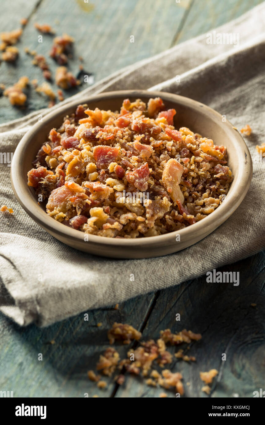 Organic Crumbled Bacon Pieces in a Bowl Stock Photo - Alamy