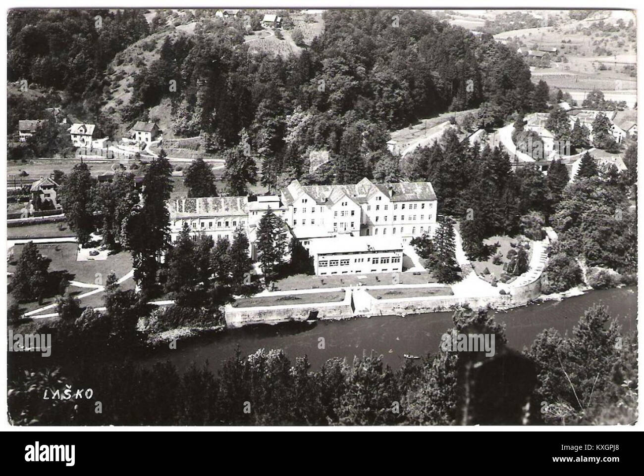 This 1966 postcard depicts a view of Lasko, Slovenia, capturing the ...