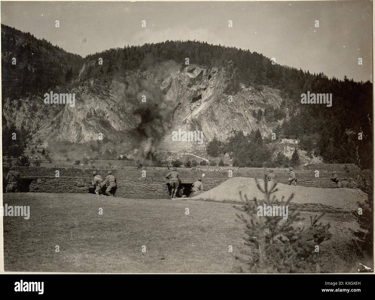 Photograph showing the firing of a 28 cm improvised mortar, depicting ...