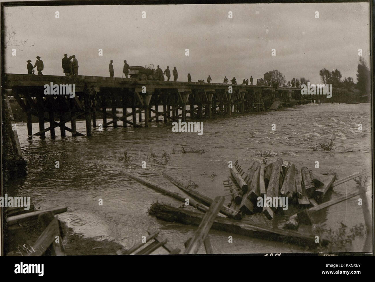This image shows a burned bridge in Stryj, with a reconstruction ...