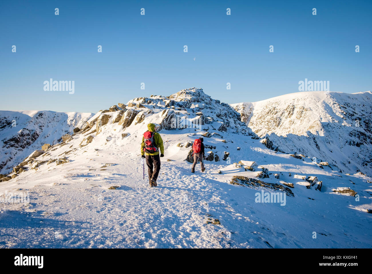 Mountaineers taking on Striding Edge Ridge on The Helvellyn Mountain ...