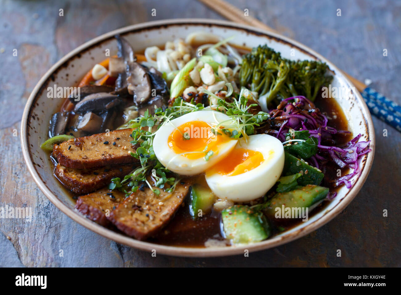 Vegetarian ramen with smoked tofu, pickled cabbage and cucumber Stock ...
