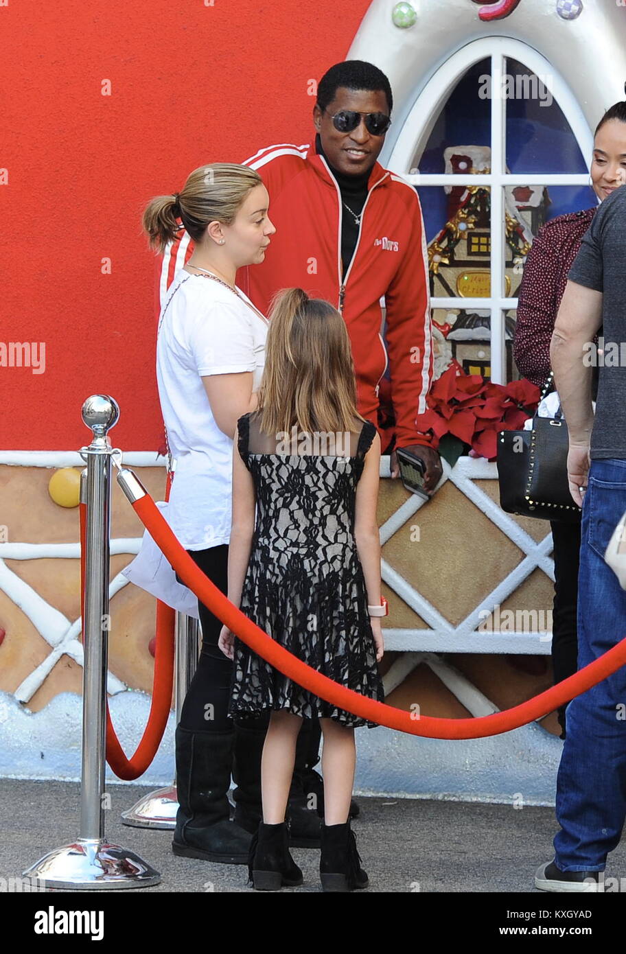Babyface meets Santa at The Grove with his wife, daughter, and her ...