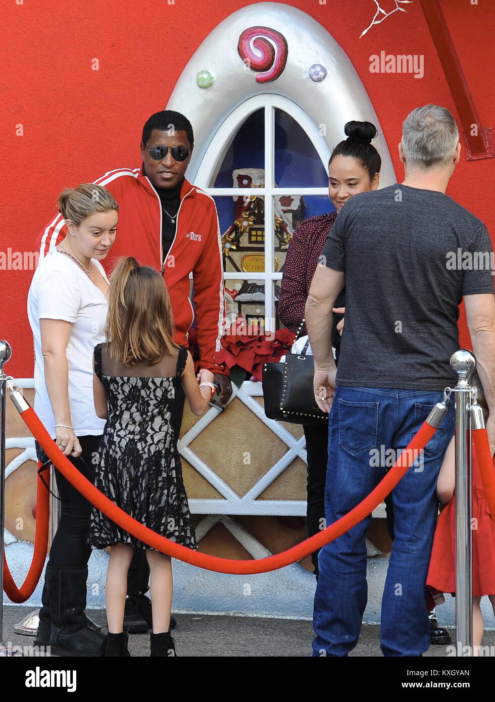 Babyface meets Santa at The Grove with his wife, daughter, and her ...