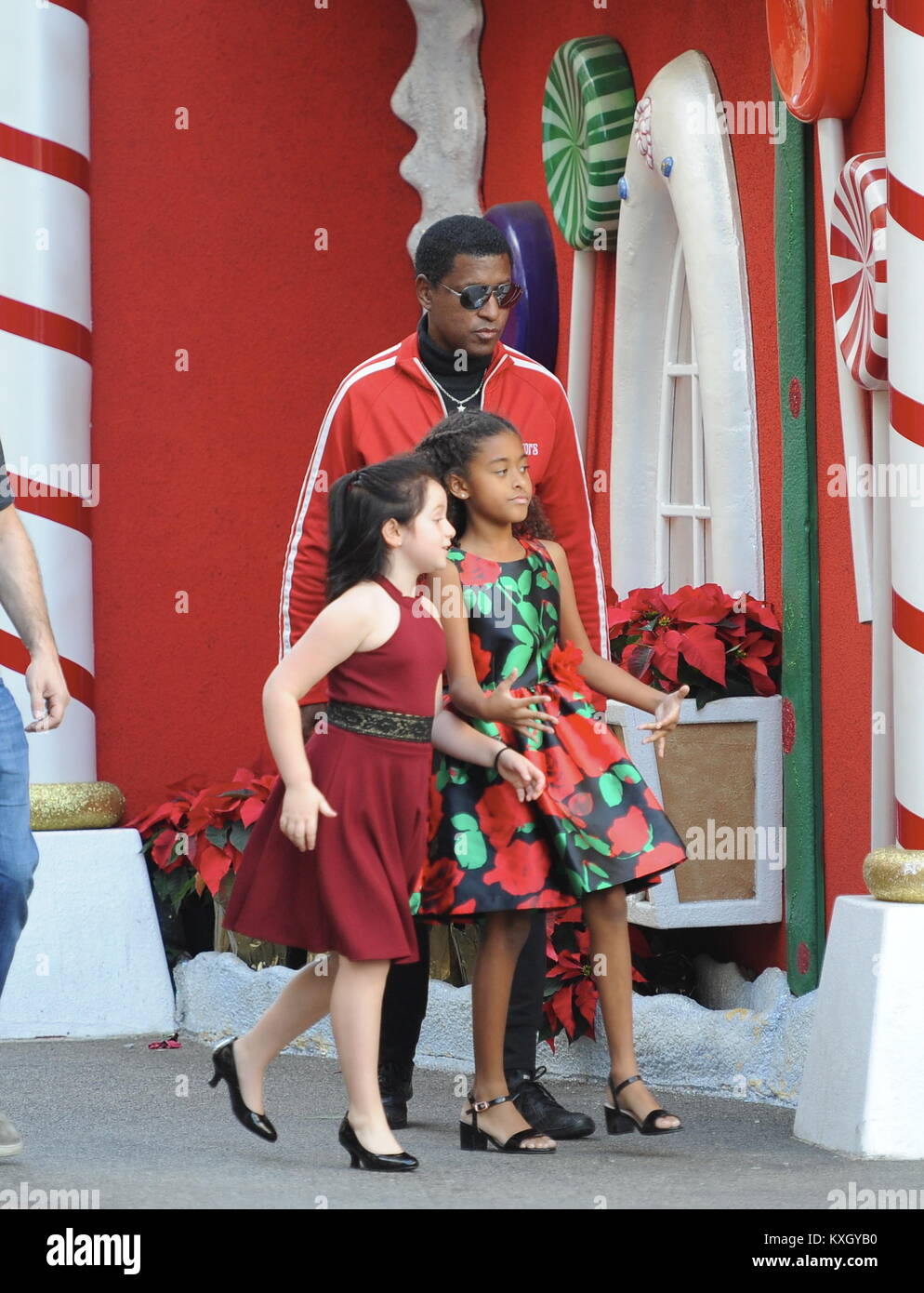 Babyface meets Santa at The Grove with his wife, daughter, and her ...