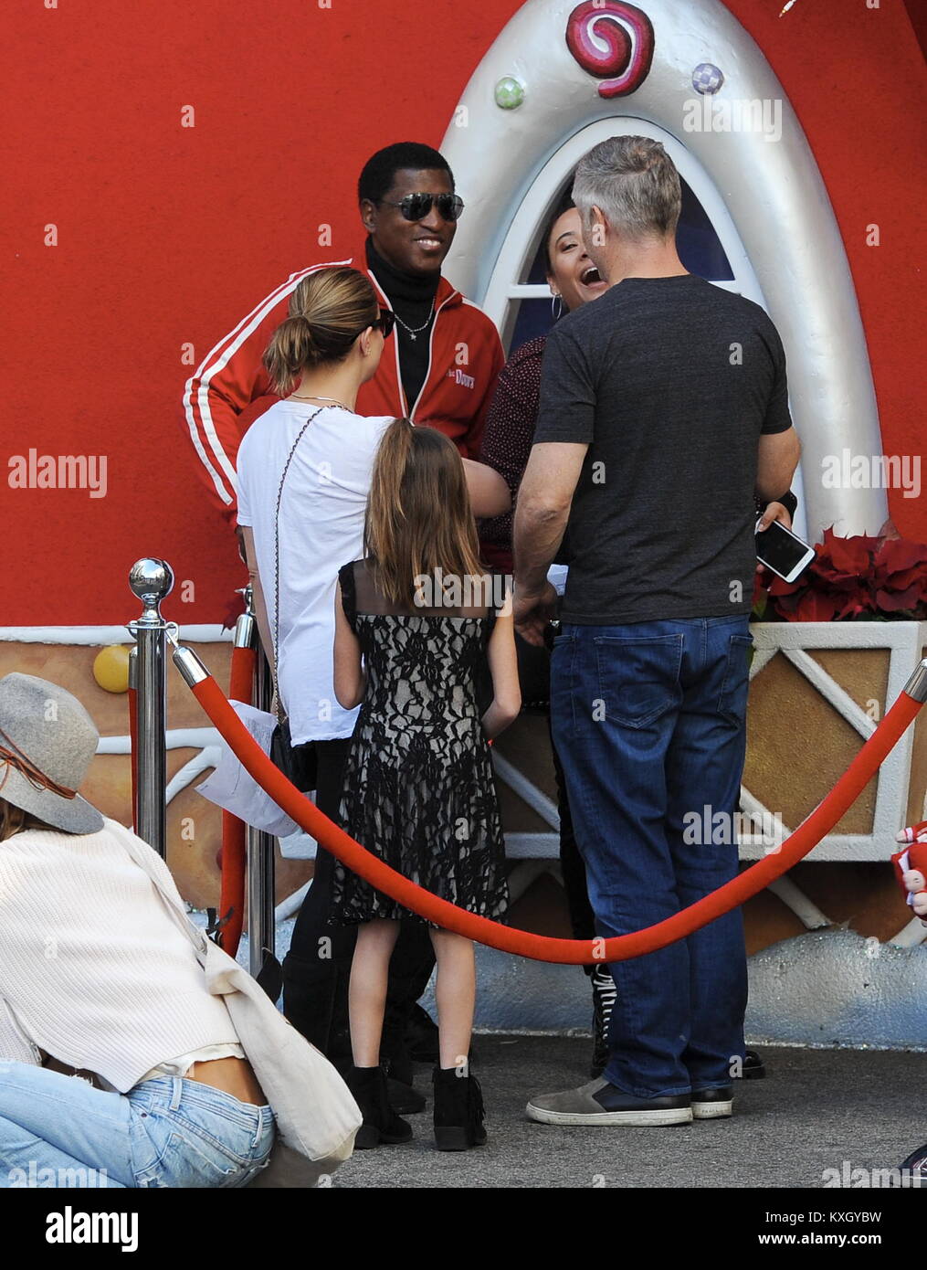 Babyface meets Santa at The Grove with his wife, daughter, and her ...