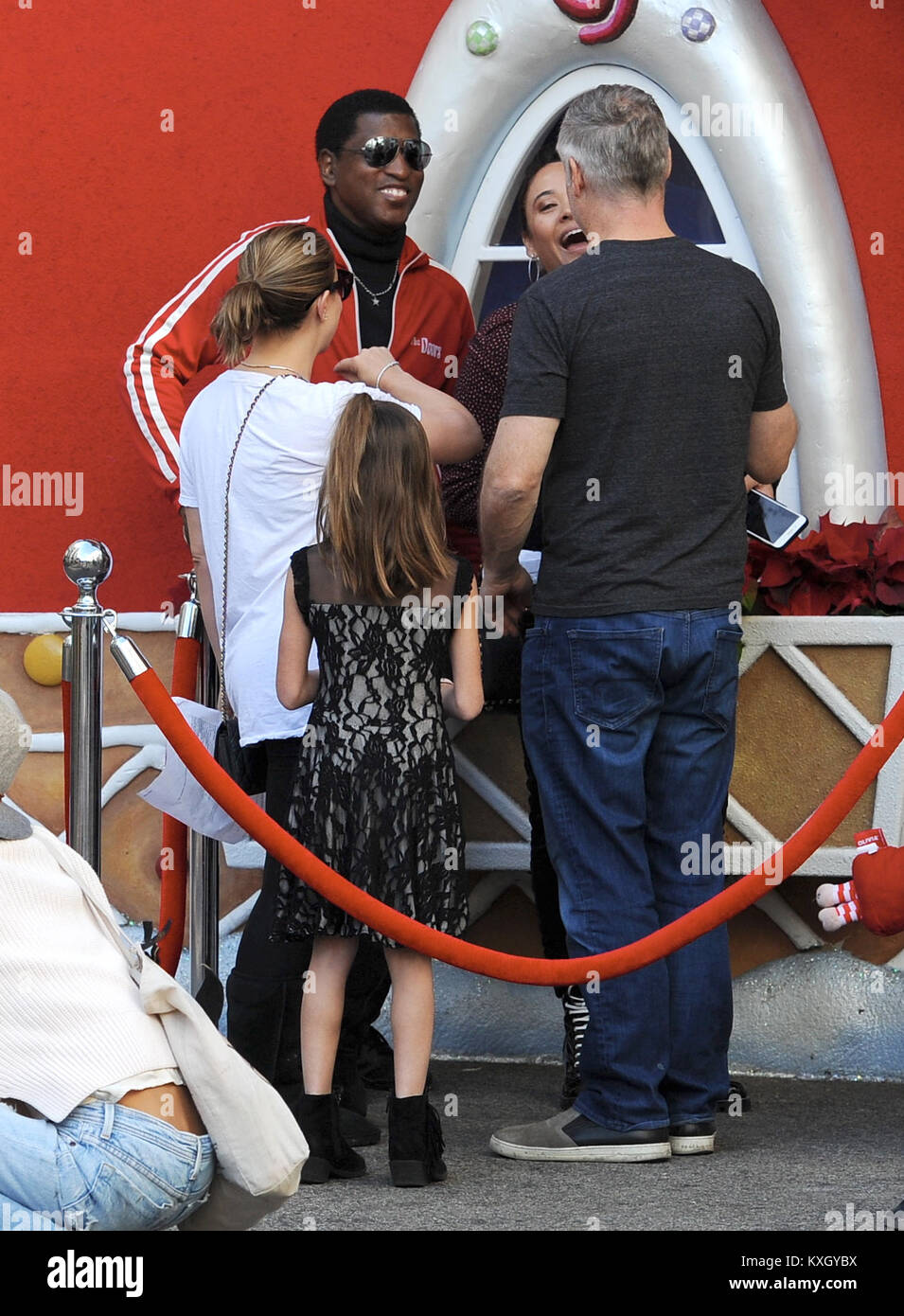 Babyface meets Santa at The Grove with his wife, daughter, and her ...