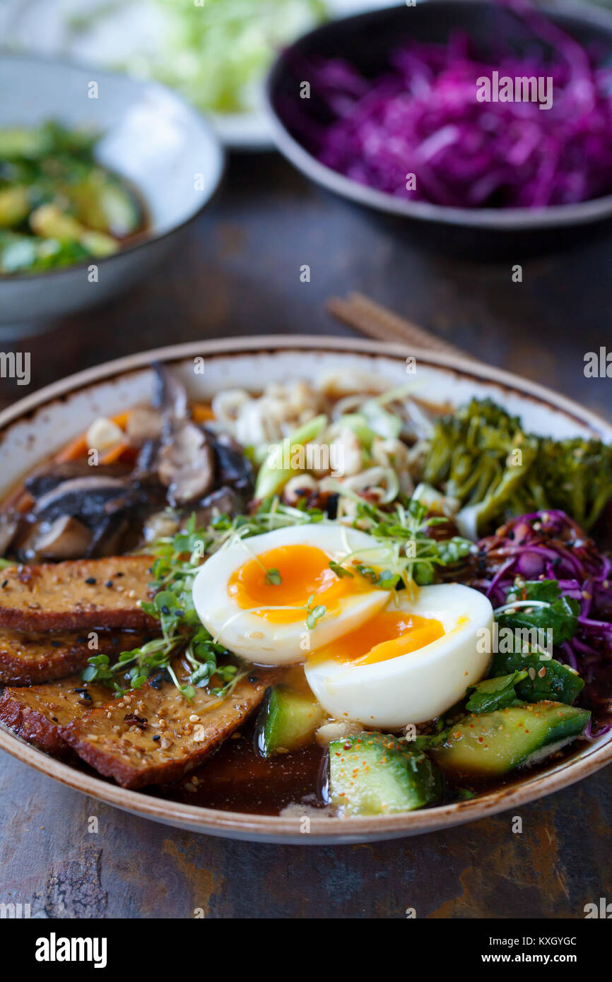 Vegetarian ramen with smoked tofu, pickled cabbage and cucumber Stock ...