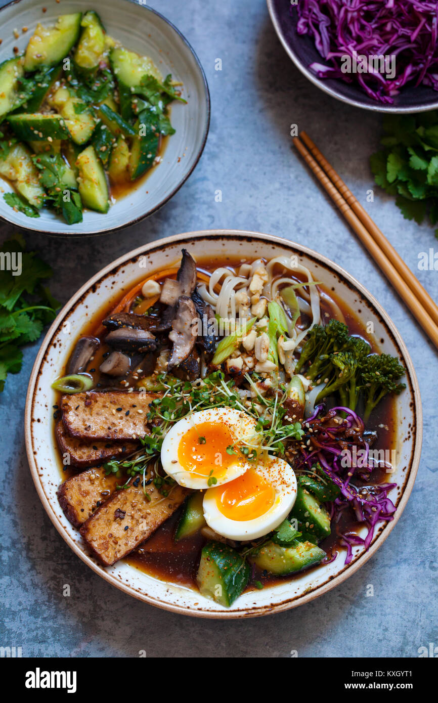 Vegetarian ramen with smoked tofu, pickled cabbage and cucumber Stock ...