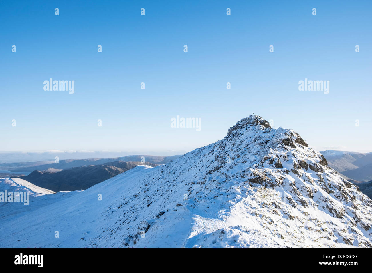 A Mountaineer taking on Striding Edge Ridge on The Helvellyn Mountain ...