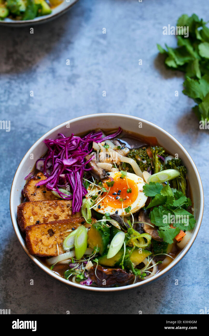 Vegetarian ramen with smoked tofu, pickled cabbage and cucumber Stock ...