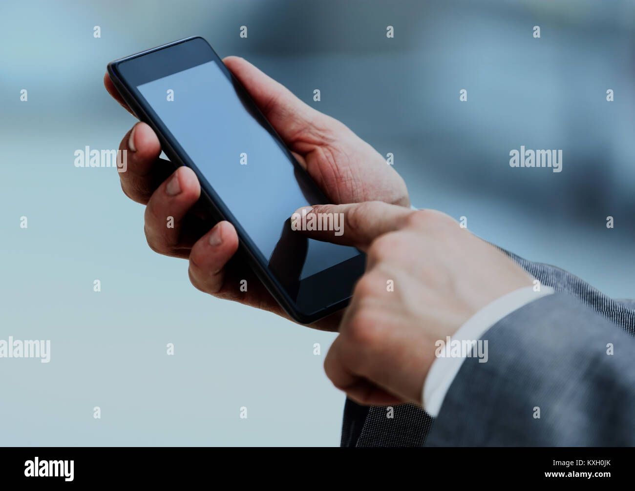 Man hand holding phone Stock Photo - Alamy