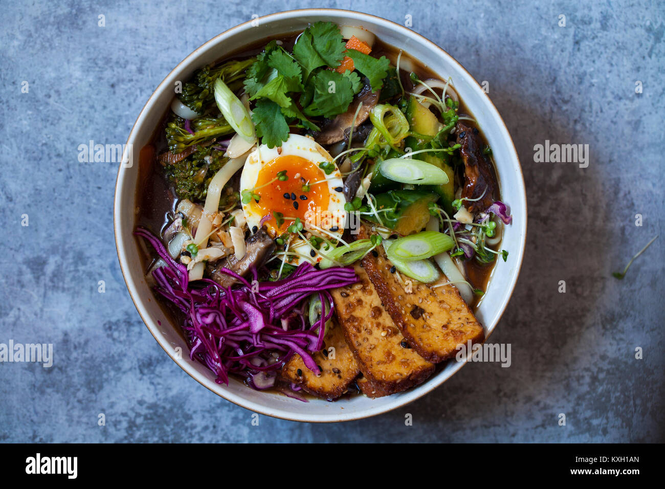 Vegetarian ramen with smoked tofu, pickled cabbage and cucumber Stock ...