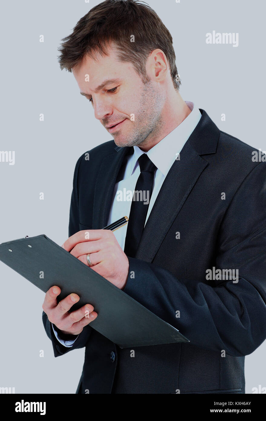 businessman writing on clipboard wear elegant suit and tie Stock Photo ...