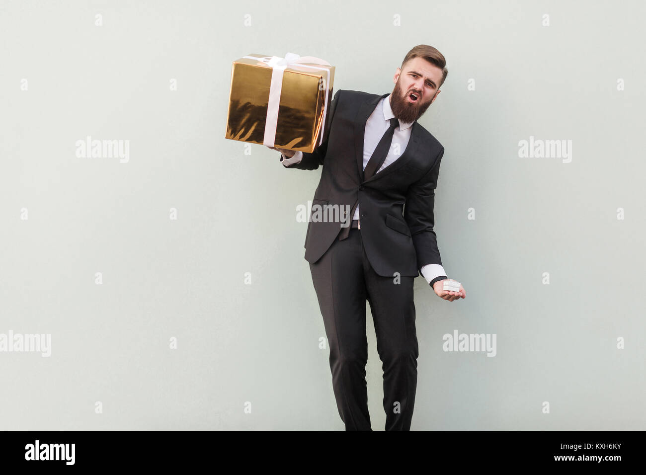 How is this possible? Small box heavier than large. Studio shot Stock ...
