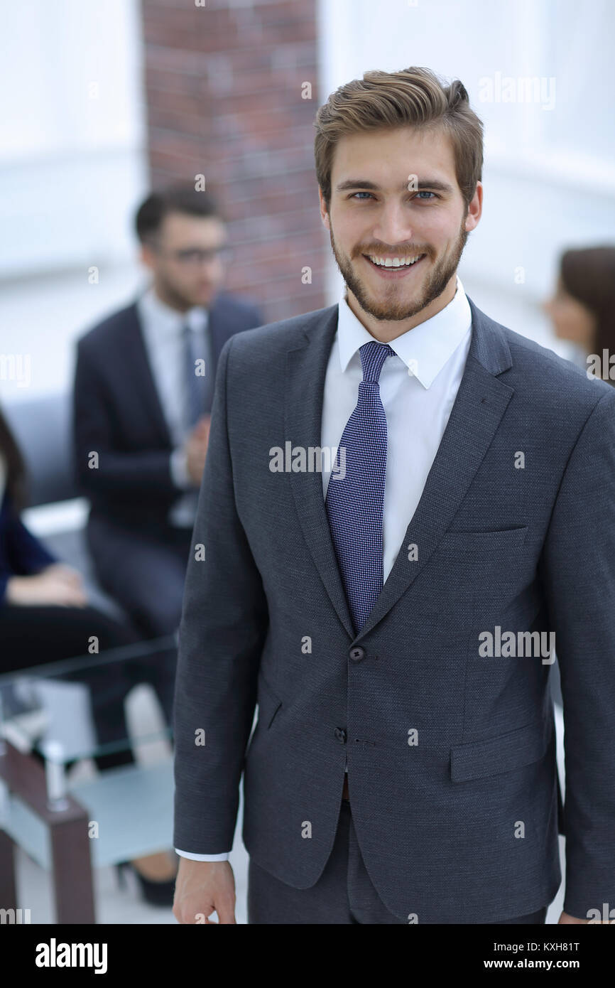 Handsome business man working at the office Stock Photo - Alamy