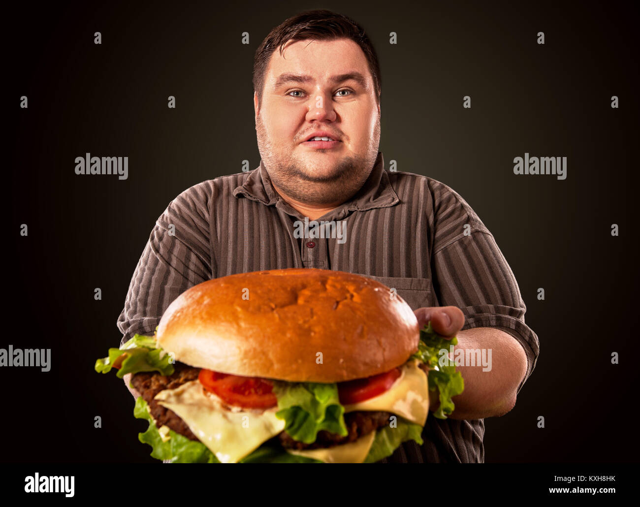 Obese man hamburger hi-res stock photography and images - Alamy