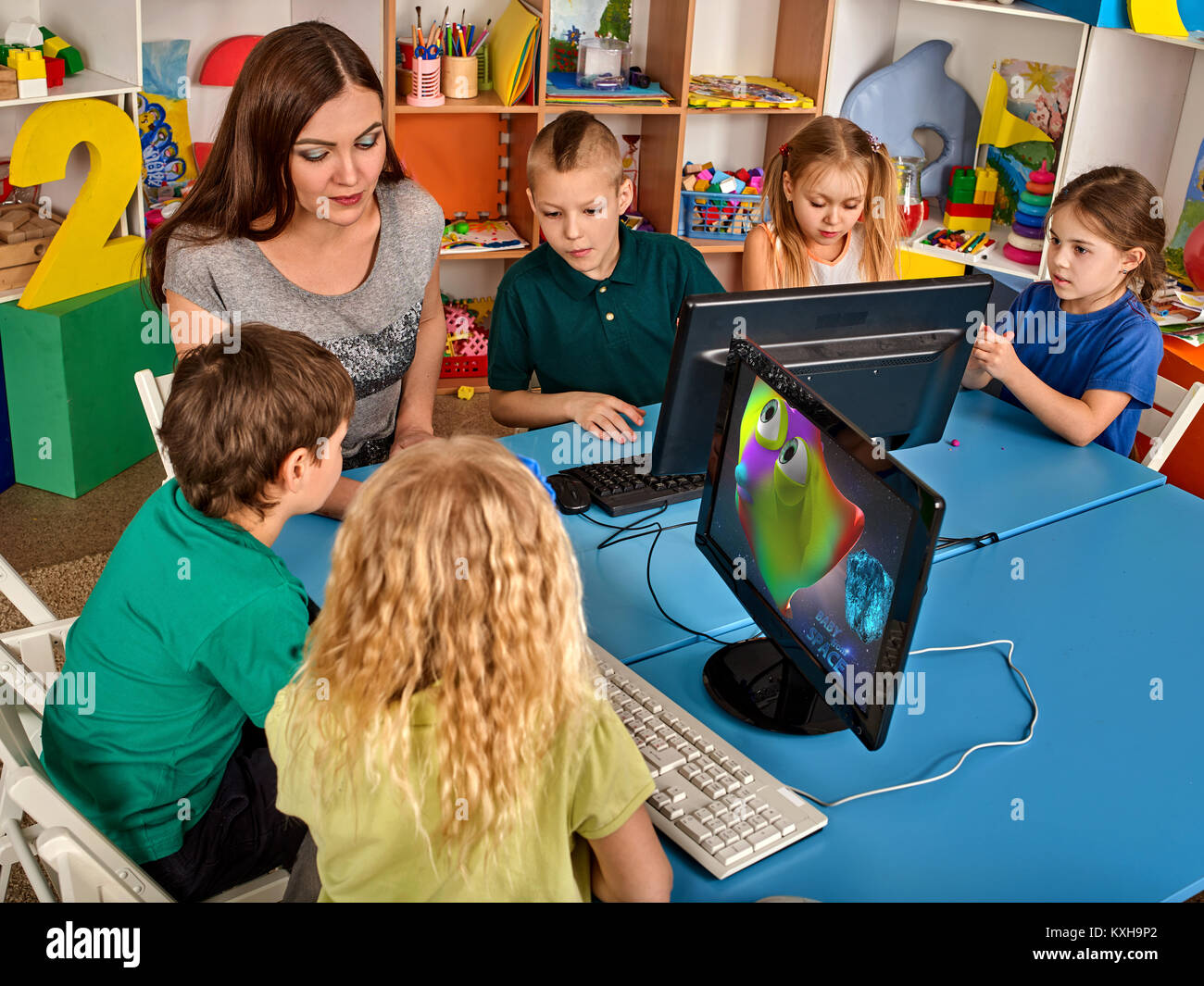 Children computer class us for education and video game Stock Photo - Alamy